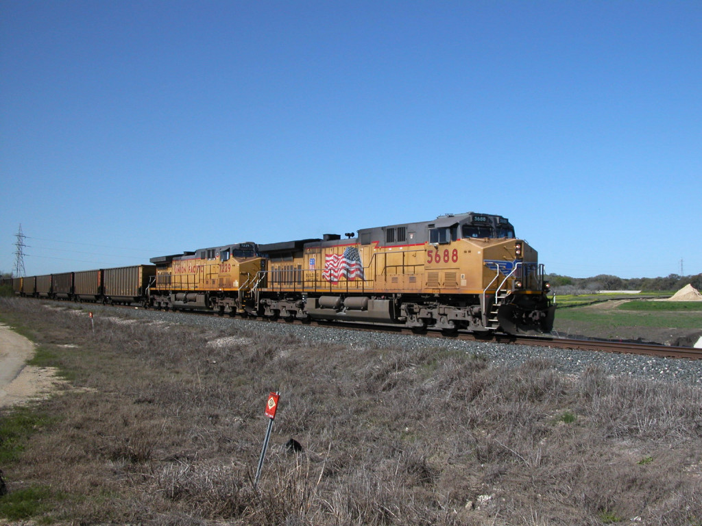 UP 5688 5Mar2012 NB approaching McCarty Lane with empty coal hoppers